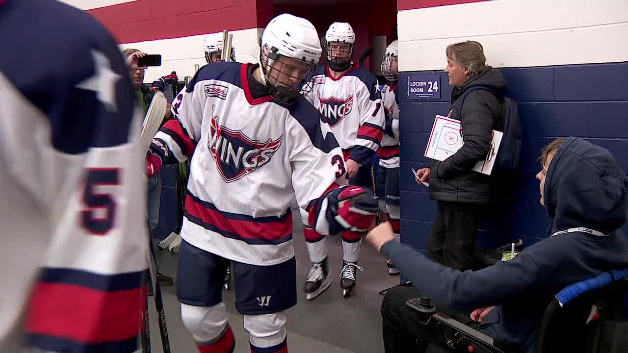 Minnesota teen defies odds, reunites with hockey team after paralysis ...
