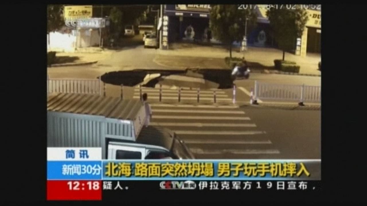 VIDEO: Man falls into sinkhole in China | FOX 11 Los Angeles
