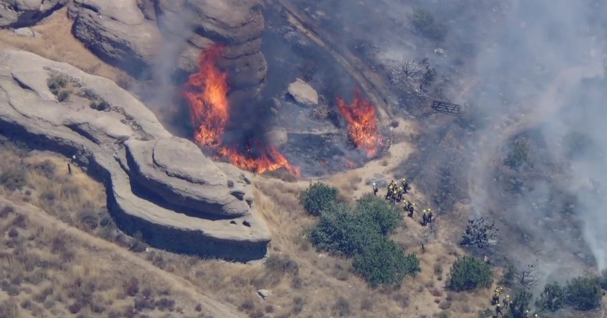 Crews battle fire threatening home in Agua Dulce | FOX 11 Los Angeles
