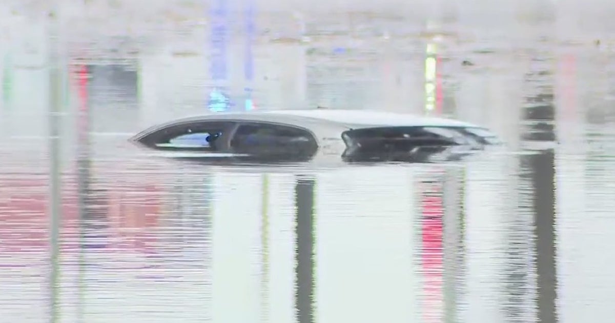 Cars submerged in water in Long Beach as atmospheric river brings major ...