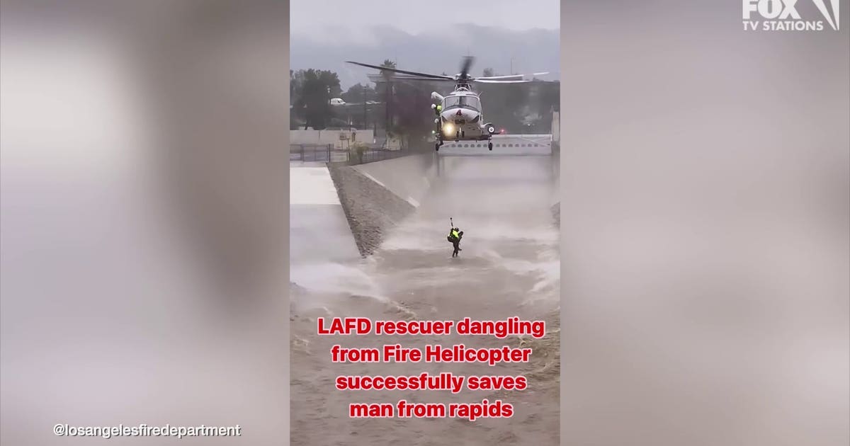 LA firefighter dangling from helicopter rescues man looking for his dog ...