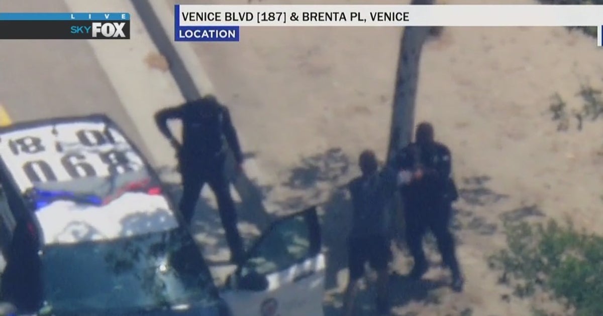 Pursuit suspect in custody after throwing punch at LAPD officer | FOX ...