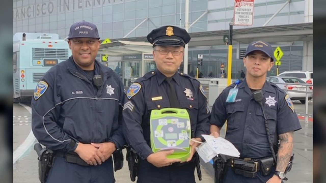 Police officers save woman's life at SFO | KTVU FOX 2