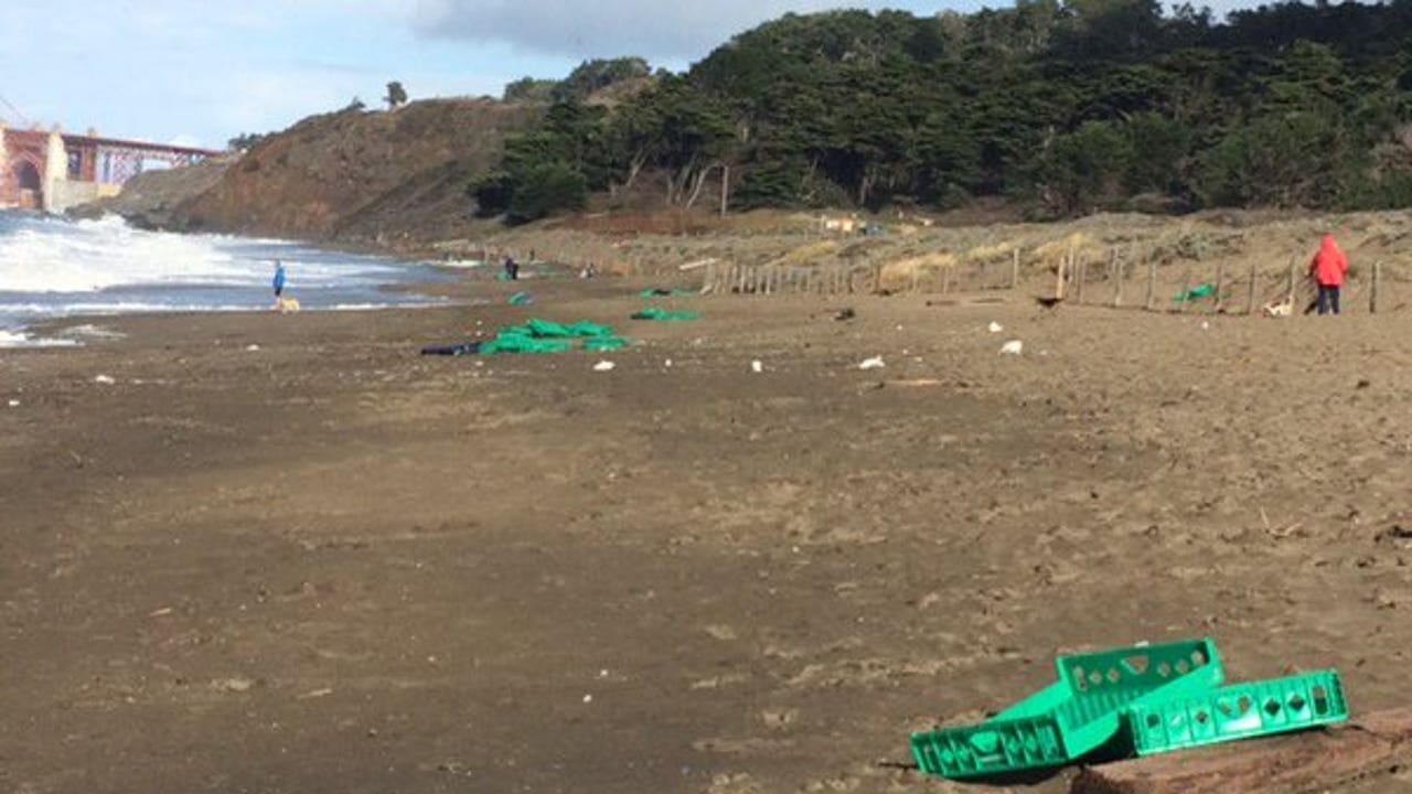 Shipping container debris washes ashore at Baker Beach