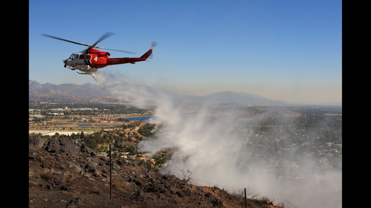 Cal Fire stations helicopter at air attack base in response to fire ...