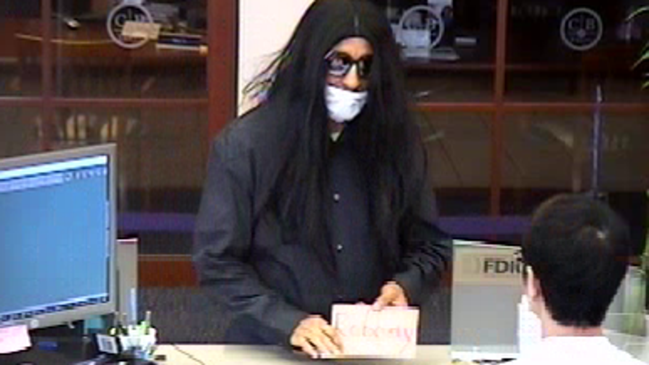 Investigators seek bank robbery suspect who wore wig, mask during ...