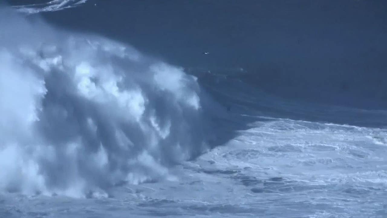 Awesome! Brazilian surfs record 80-foot wave in Portugal | KTVU FOX 2