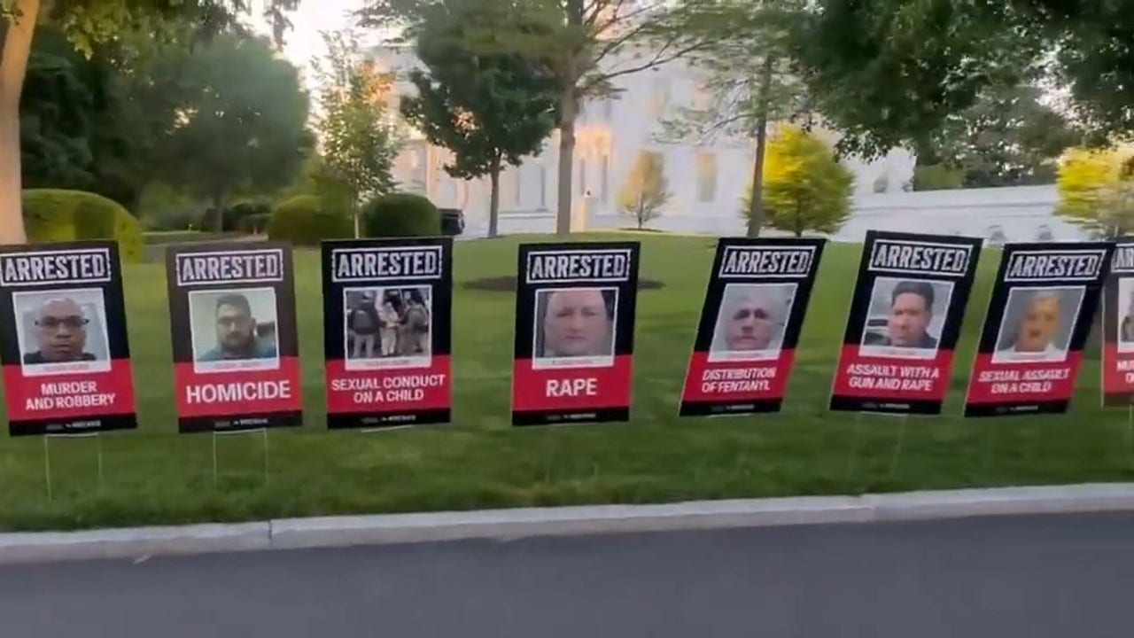 White House mugshots: ‘Arrested’ posters line lawn as Trump marks 100 ...