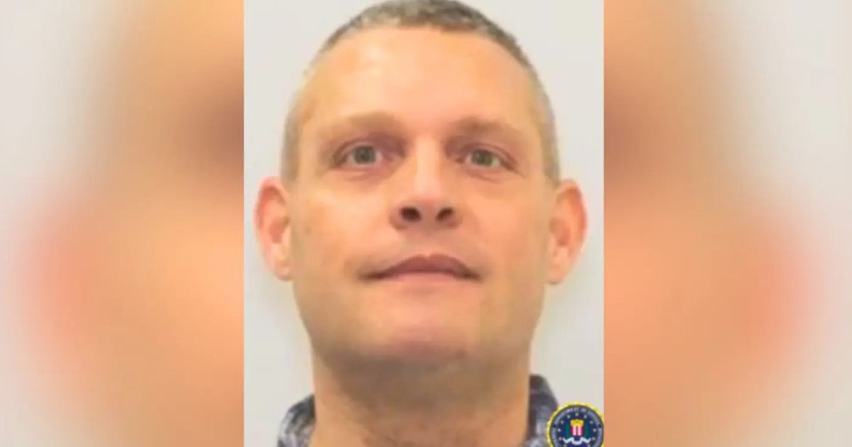 Suspect in custody after ramming his car into FBI building gate in ...