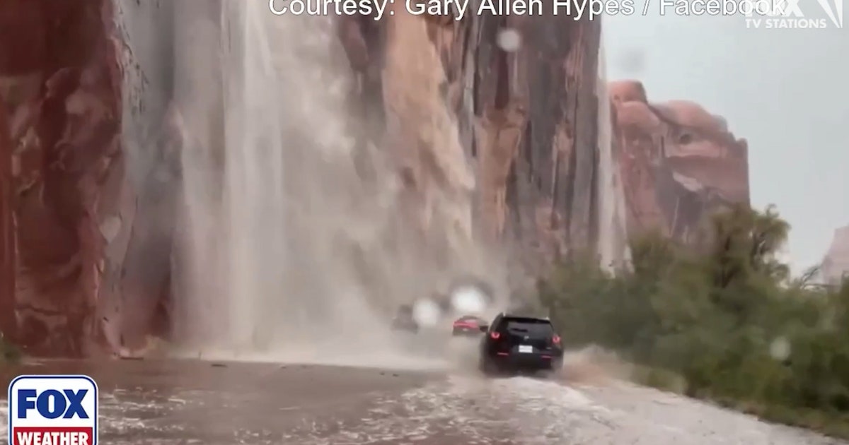 Watch: Travelers in Utah fearlessly drive through waterfalls caused by ...