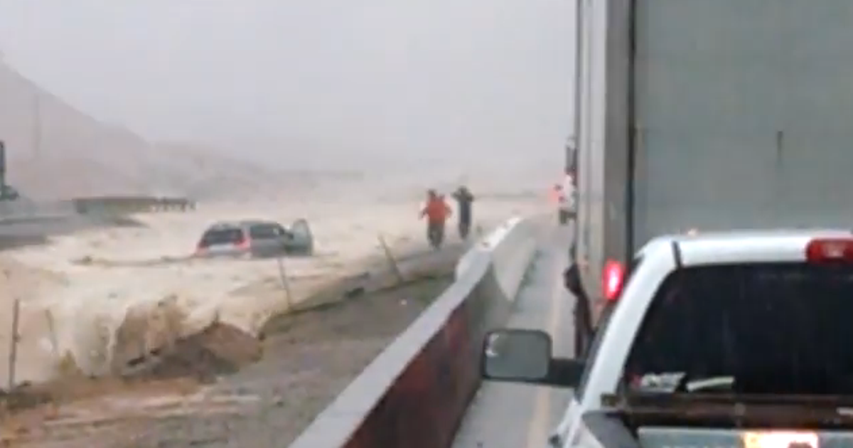 Harrowing flood video: Rushing water sweeps man under van, into ravine ...