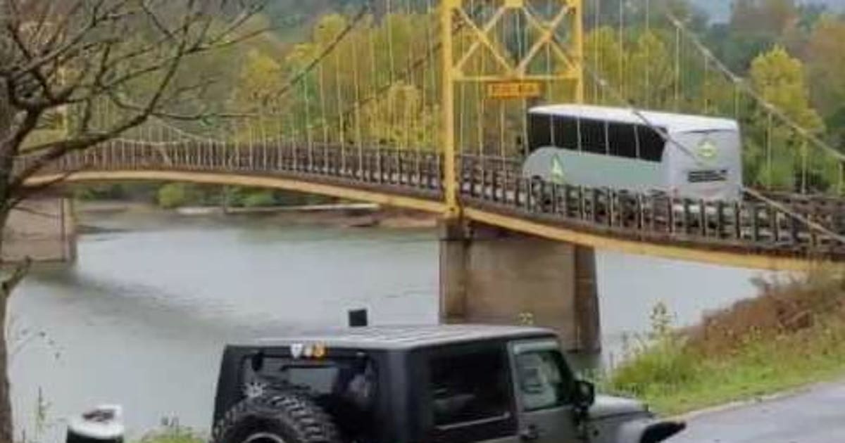 Video shows bridge dip sharply as overweight bus drives over | FOX 13 ...