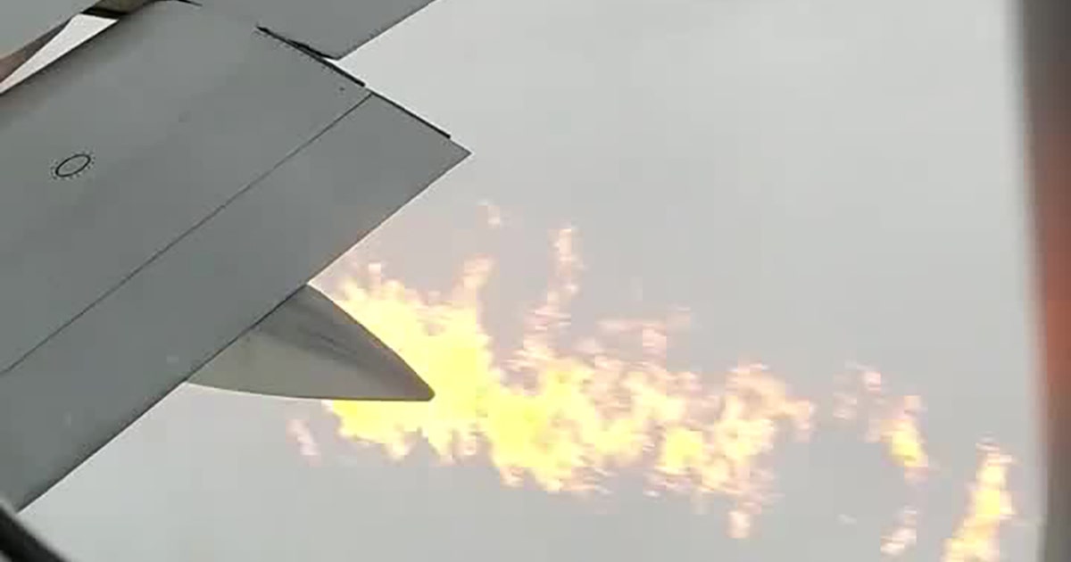 Video: Flames shoot from plane's wing as NY-bound flight makes ...