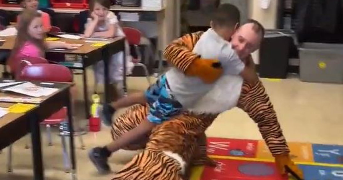 Watch: Father soldier dressed as mascot surprises son on 1st day of ...