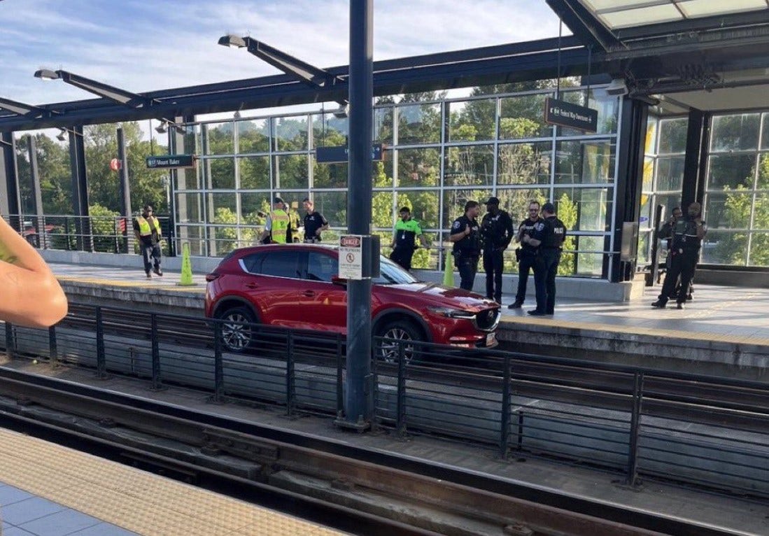 Car drives onto light rail tracks, disrupting service | FOX 13 Seattle